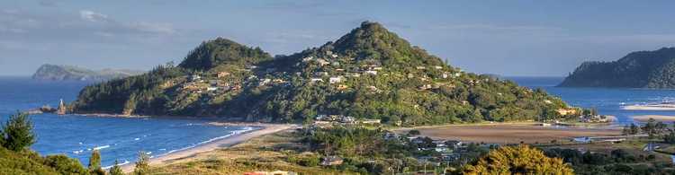 Visit beautiful sandy beaches in Tairua, New Zealand